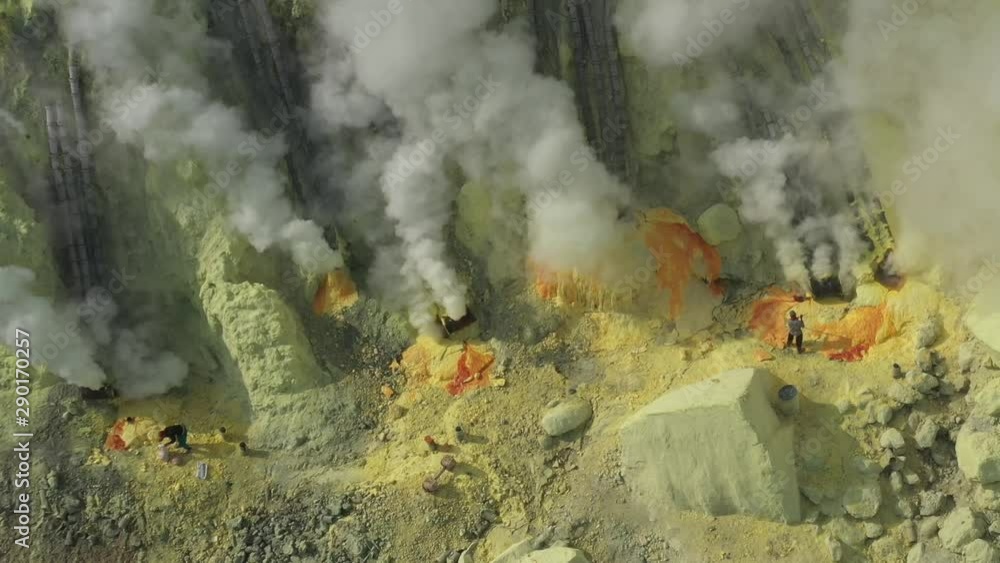 Cinematic Aerial View Of Sulfur Mine Spewing Toxic Sulfur Gas Clouds At The Crater Of Kawah Ijen