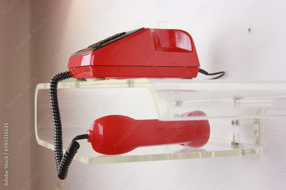 old retro telephone red green plastic isolated on white background side ...