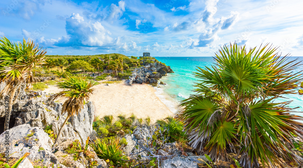 Mayan ruins of Tulum at tropical coast. God of Winds Temple at paradise ...