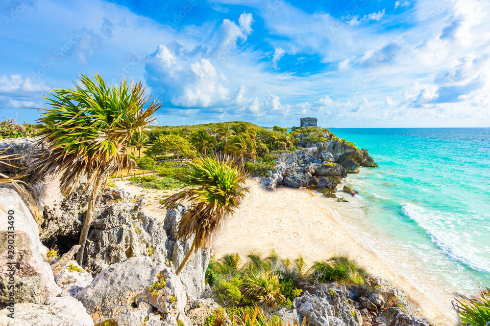Mayan ruins of Tulum at tropical coast. God of Winds Temple at paradise ...