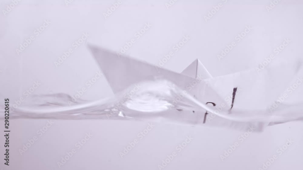 Folded paper boat is floating in a turbulent raging water. Mental state ...