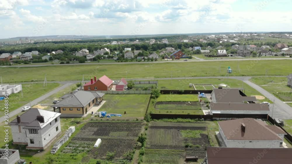 The concept of rural life. Gardening. A lot of greenery. Fresh air ...