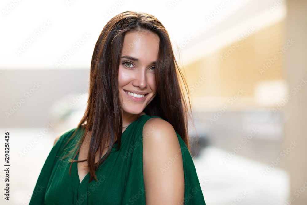 Young pretty likable cheerful woman posing summer city outdoor ...