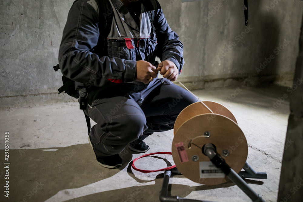 The technician attaching fiber optic on the Optical Distribution Frame ...