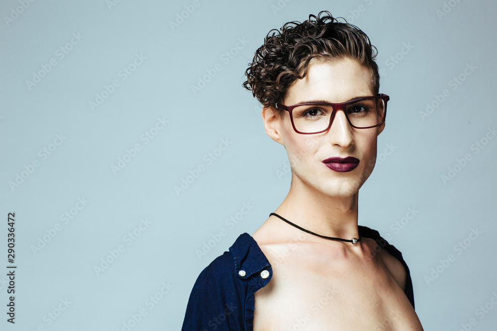 Portrait of a young gender fluid person with make up Stock Photo ...