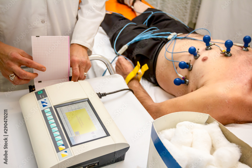 Older patient is under ECG or EKG test Stock Photo | Adobe Stock