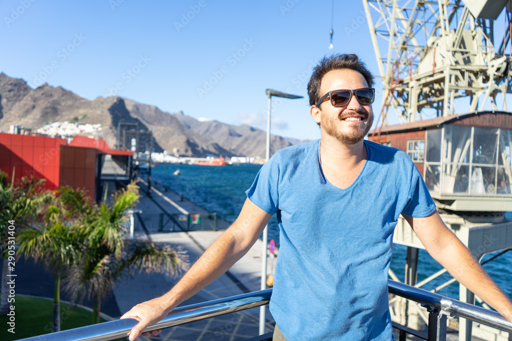 Happy Youth dude looking to the side having a good moment, with ...