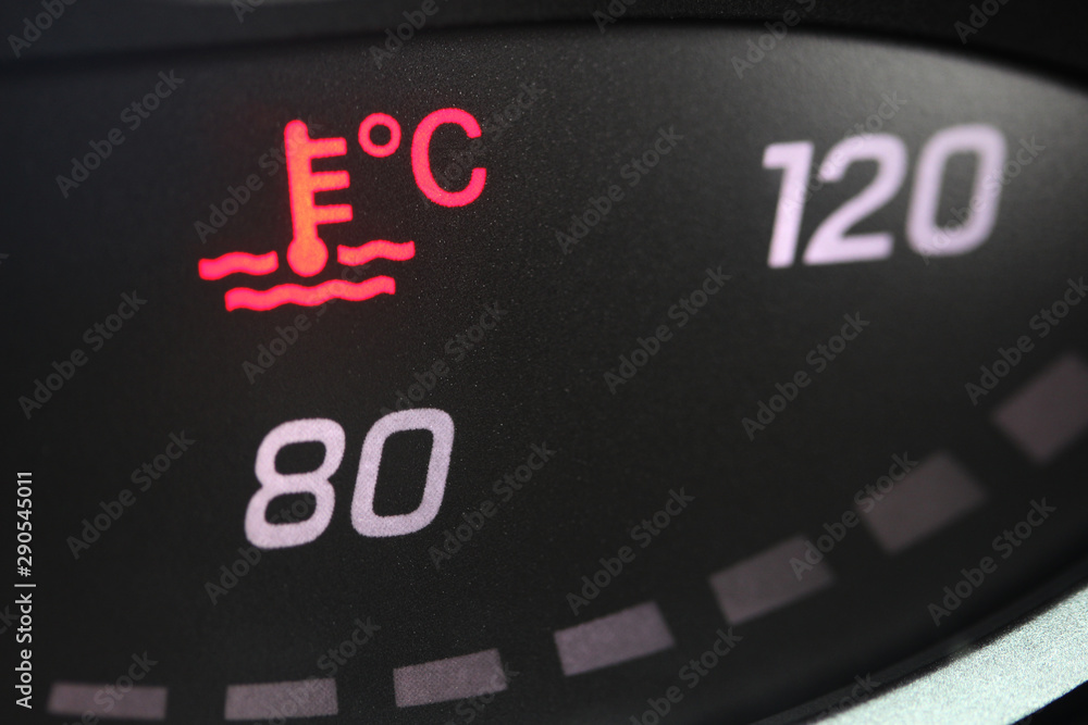 Red vehicle coolant warning light Stock Photo | Adobe Stock