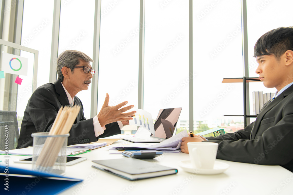 Senior businessmen are angry with unsuccessful new subordinates. With a ...