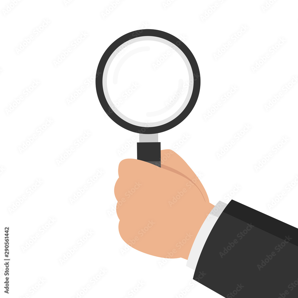 Hand holding a magnifying glass. Audit, analysis, inspection concepts ...