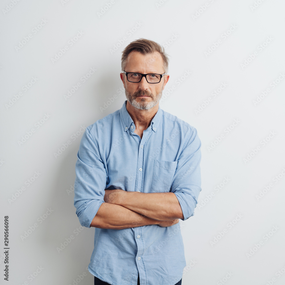 Stern serious businessman staring at the camera Stock Photo | Adobe Stock