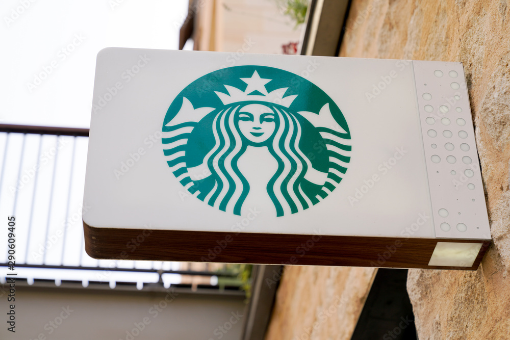 Starbucks Coffee shop sign logo in street Stock Photo | Adobe Stock