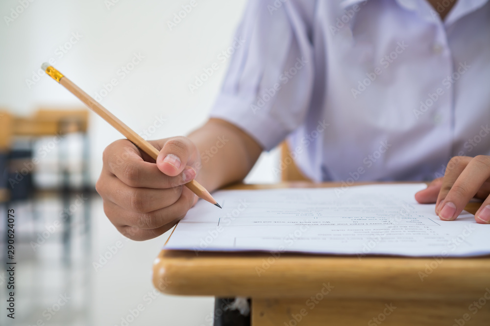 Education uniform students testing exam with pencil for multiple-choice ...