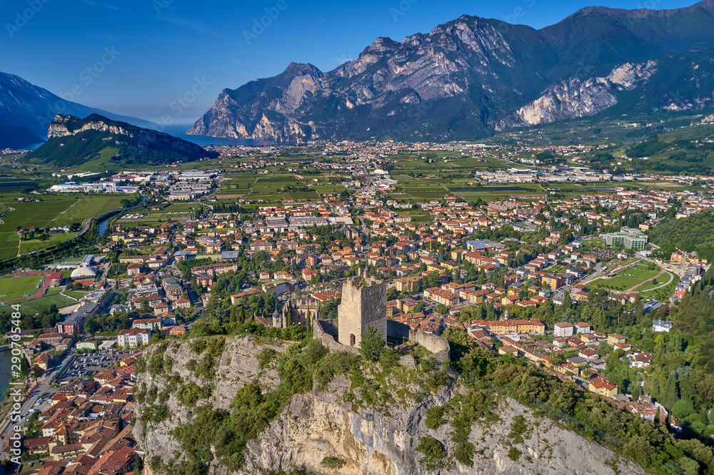 Flying on drone, aerial view of Arco Castle ruins, Lake Garda. Italy ...