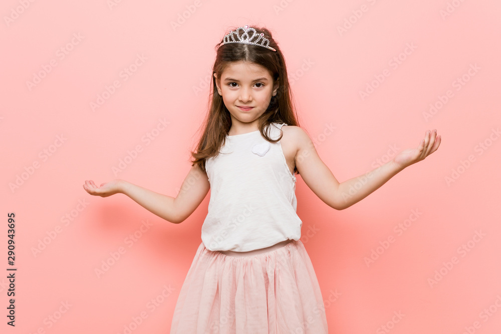 Little girl wearing a princess look showing a welcome expression. Stock ...