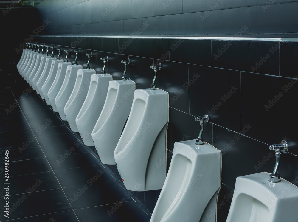 Row of outdoor urinals men public toilet, closeup urinals in men’s ...