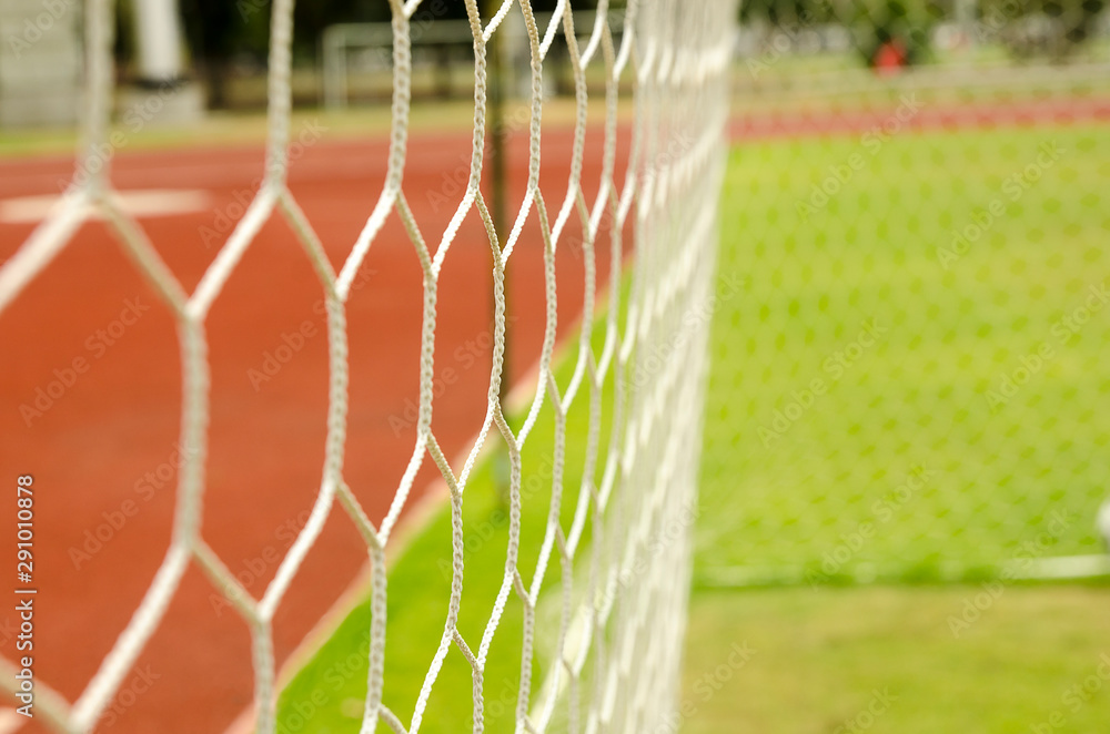 The white Net marking on the artificial green grass soccer field Stock ...