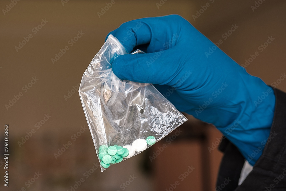 suspicious package with a substance similar to pills of different ...