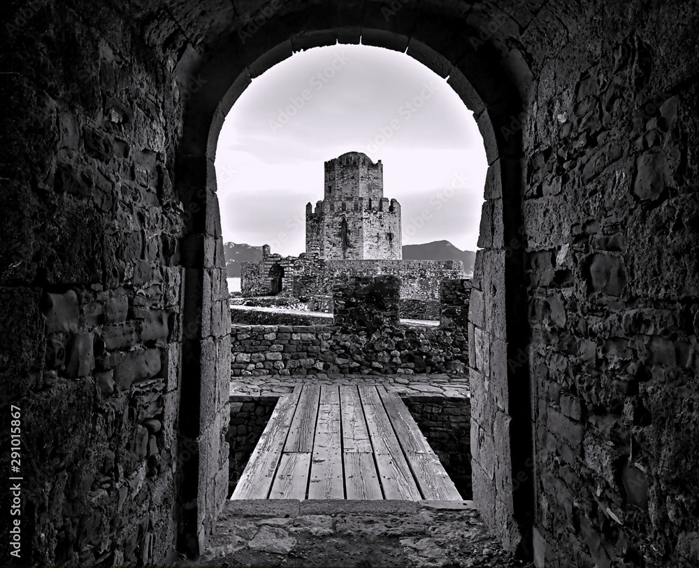 Entrance to wooden bridge and impressive three-tiered fortified ...