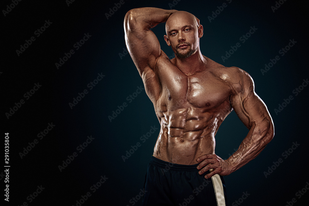 Bodybuilding competitions on the scene. Handsome and fit man sportsmen ...