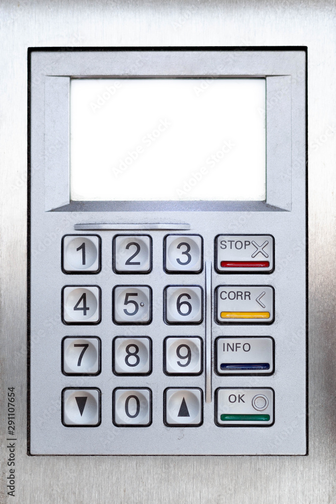 Modern silver keypad with a blank shining display, copy space. Stop ...