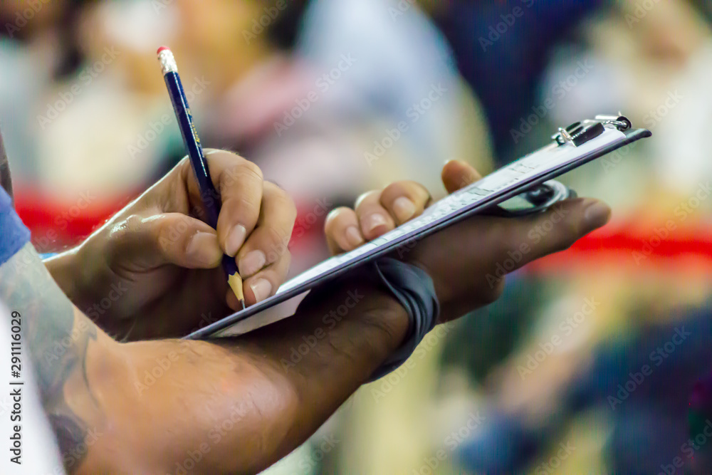 Professional hand checklist and check time. Stock Photo | Adobe Stock