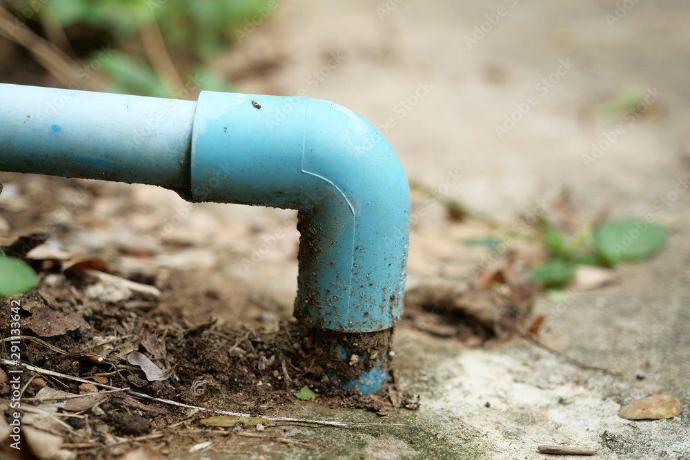 Plumbing pipe coupling on concrete floor, Blue PVC pipe for water ...