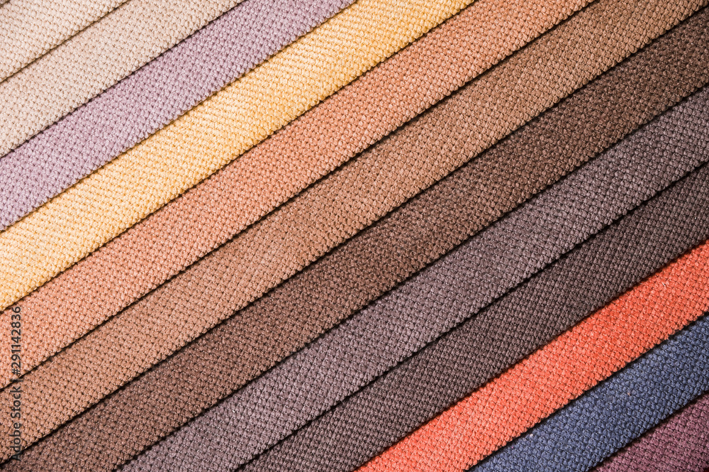 Colorful and bright fabric samples of furniture and clothing upholstery ...