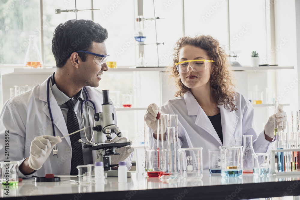 Team of Medical Research Scientist Conducts Experiments in Laboratory ...