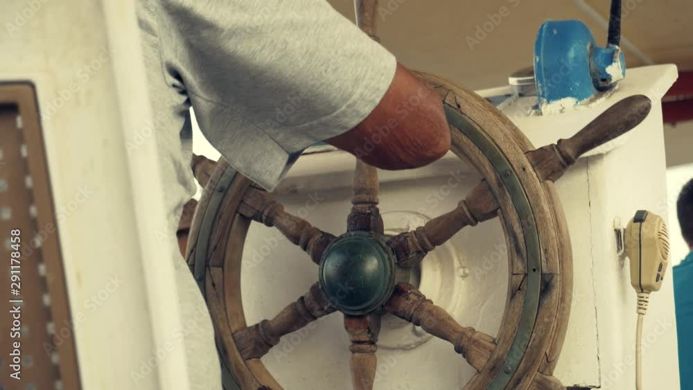 Captain Turning Steering Wheel Floating Boat.Ship Floating Sea.Captain ...