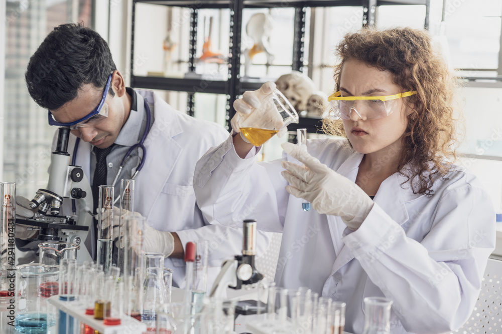 Team of Medical Research Scientist Conducts Experiments in Laboratory ...