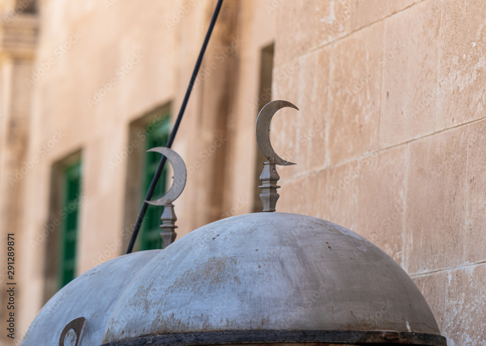 Fotka „Muslim crescents on drinking water tanks on the territory of the ...