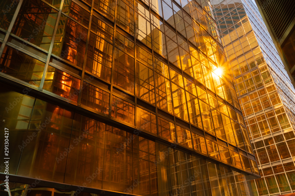 Golden building. Windows glass of modern office skyscrapers in ...