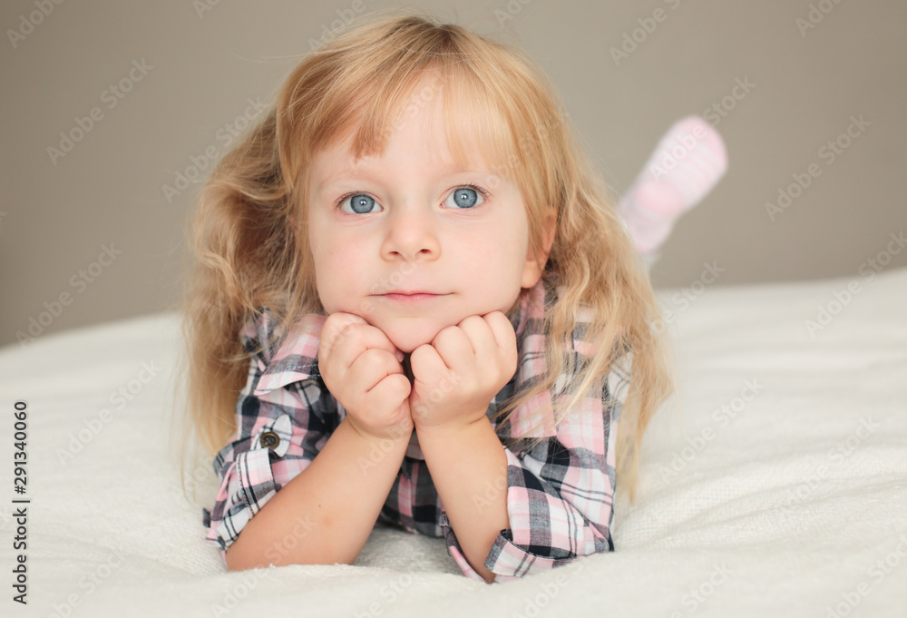 Close Up Portrait Of Cute Blonde Toddler 3 Years Old Girl With Big close-up-portrait-of-cute-blonde-toddler-3-years-old-girl-with-big