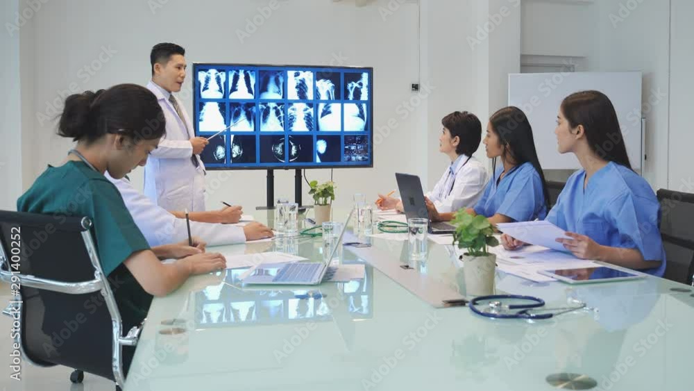 Asian medical team present x-ray and meeting together for sharing ...
