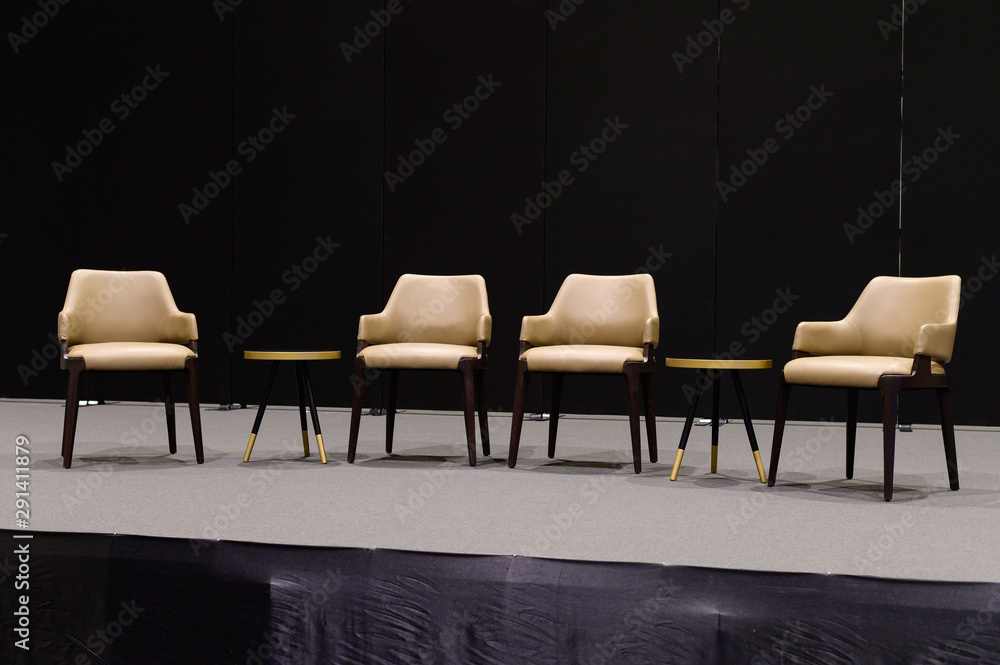 Empty chairs on stage ready for seminar Stock Photo | Adobe Stock