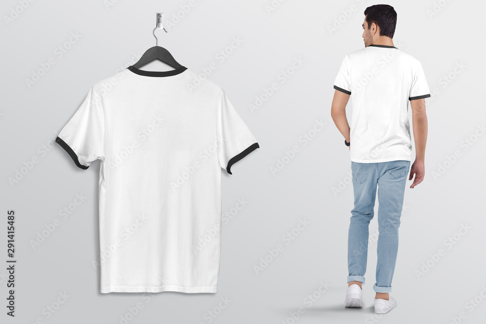 Hanging white plain ringer t shirt on wall along with male model in ...