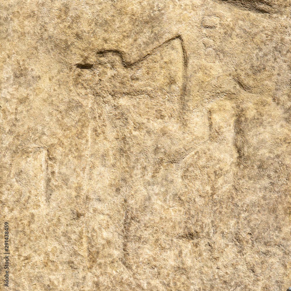 Stone with ancient carvings of viking age type. Old dark ages ...