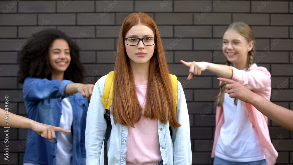 Depressed bullying victim eyeglasses looking camera, teenagers pointing ...