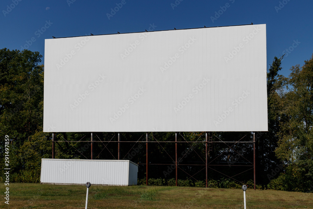 Old Time Drive-In Movie Theater with blank white screen for copy space ...