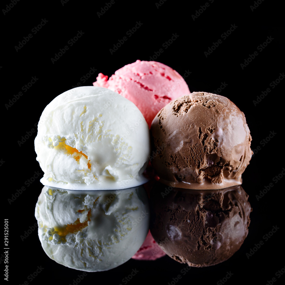 Ice cream scoop with vanilla, chocolate, strawberry on black background ...