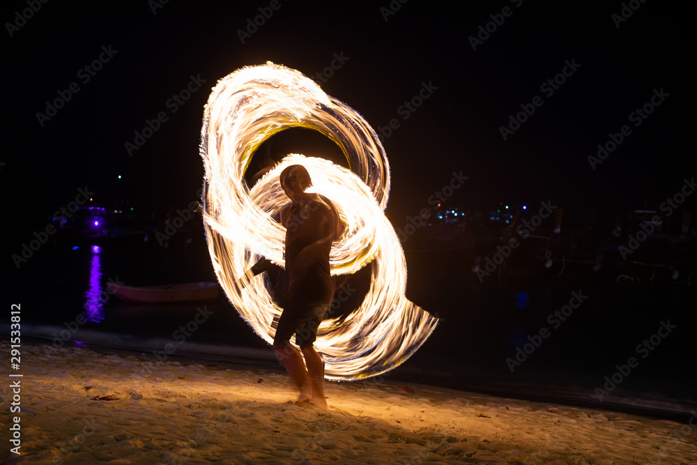 Amazing fire dancers Swing fire dancing show fire show on the beach in ...