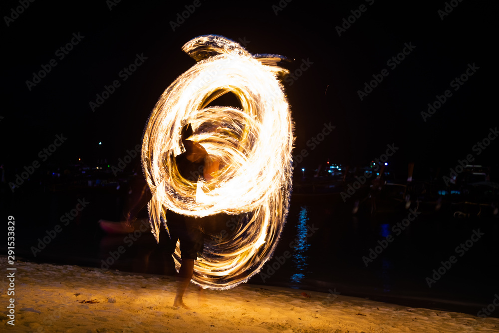 Amazing fire dancers Swing fire dancing show fire show on the beach in ...