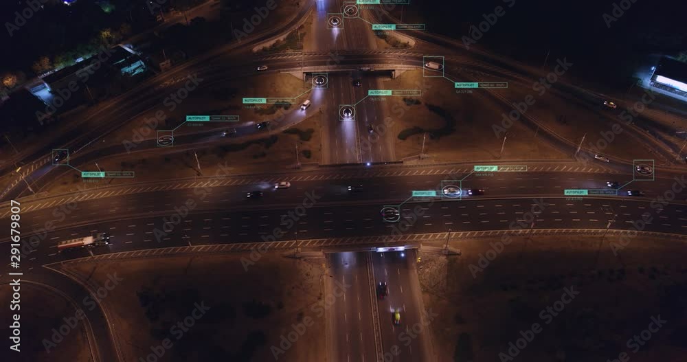 Self autonomous unmanned Cars driving on night crossroads Aerial view ...