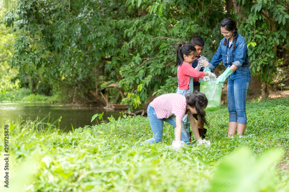 Group family asian children collecting garbage and plastic on the river ...