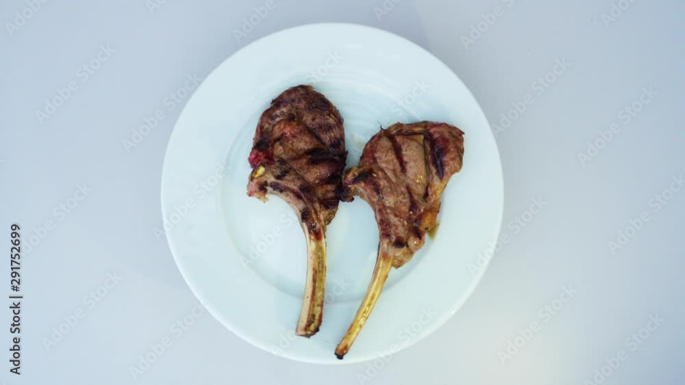 Top view, grilled lamb ribs like meat dish for lunch at a restaurant in ...