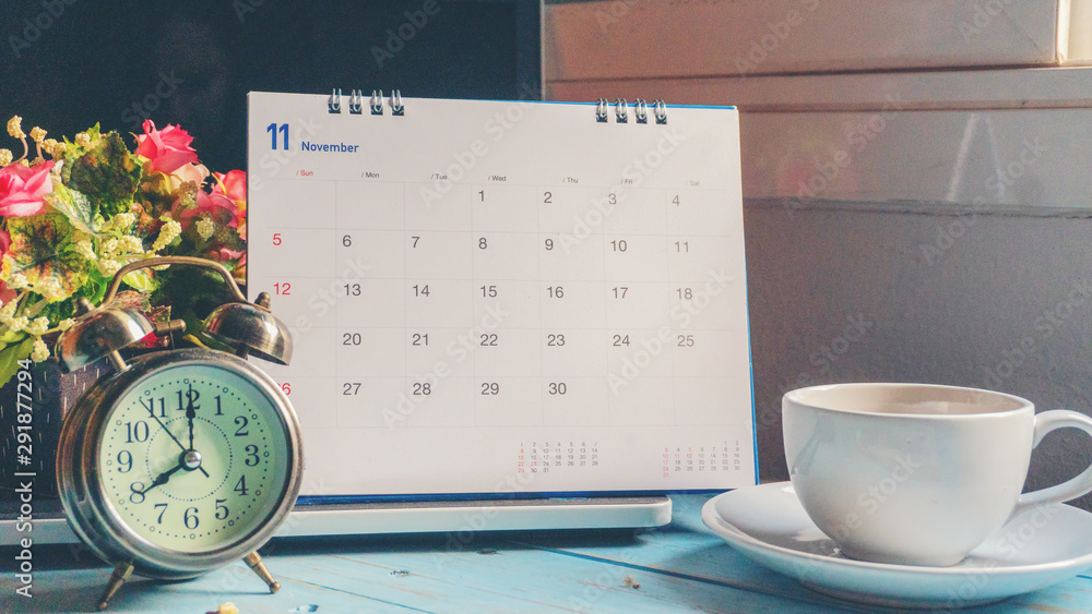 Desktop Calendar 2020 place on office desk.Calendercup of coffee and ...