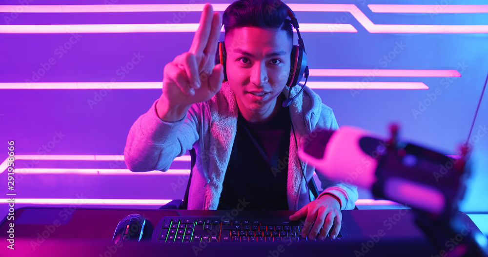 vlogger play game and live Stock Photo | Adobe Stock