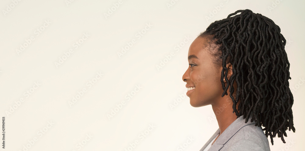 Studio Portrait Of Smiling African American Businesswoman, Side View ...