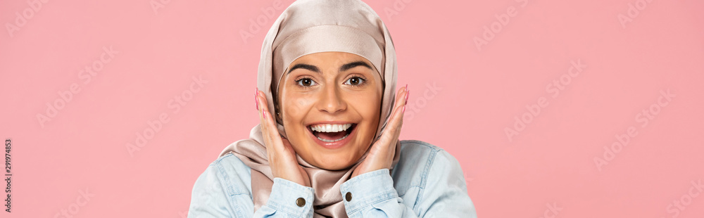 beautiful excited muslim girl in hijab, isolated on pink Stock Photo ...